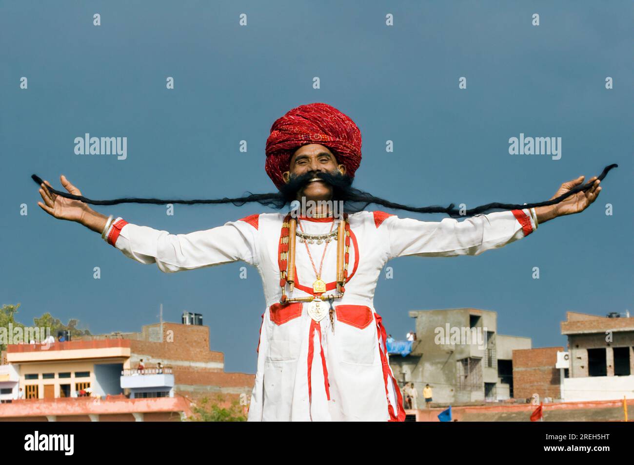 Indian Man in traditional clothing with an impressively long mustache ...
