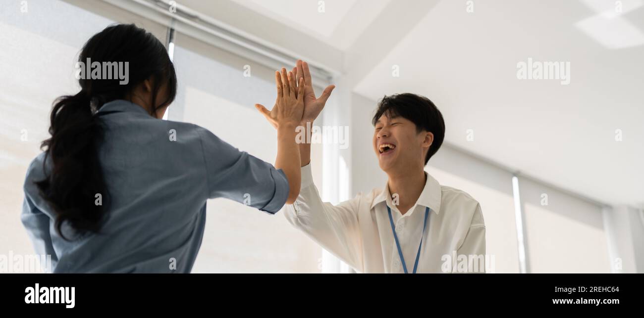 business team people give high five happy excited in teambuilding ...