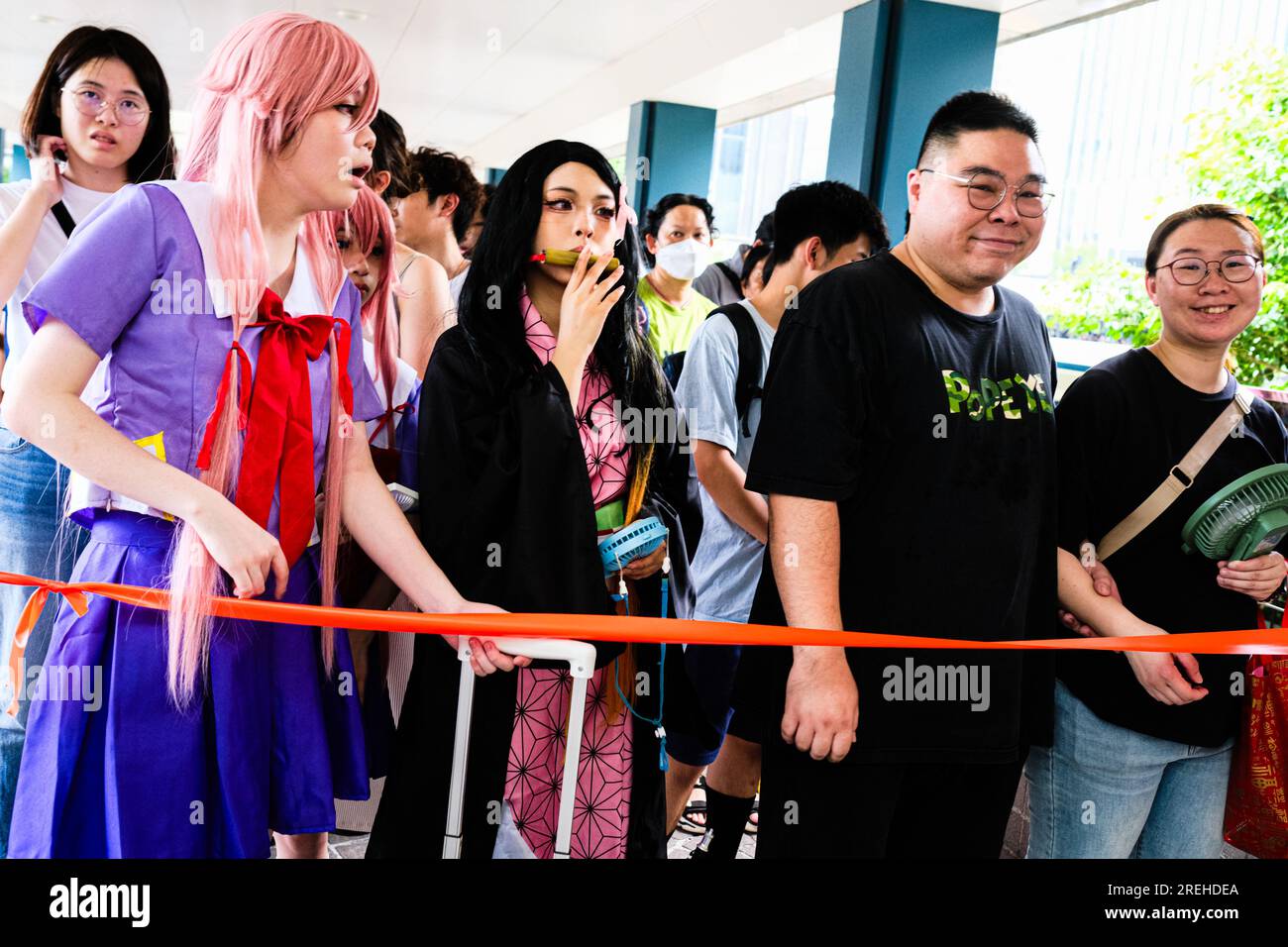 Hong Kong, China. 28th July, 2023. Comic fans wait in line to enter the ...