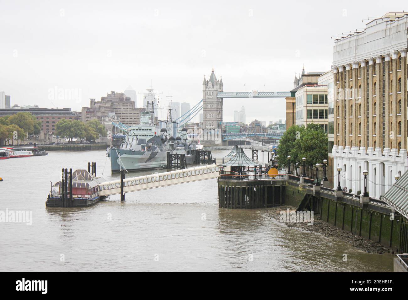 A battleship in a river in the city Stock Photo - Alamy