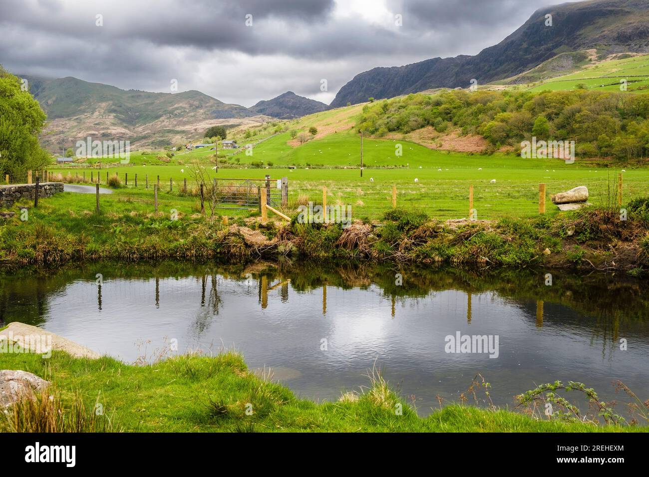 View across Afon Dwyfor river in Cwm Pennant valley in Snowdonia ...