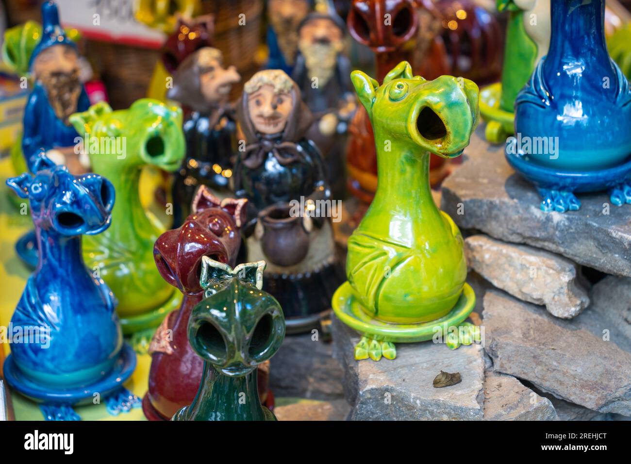 Colorfully painted ceramic dragons and figurines in the Elf Yard ...