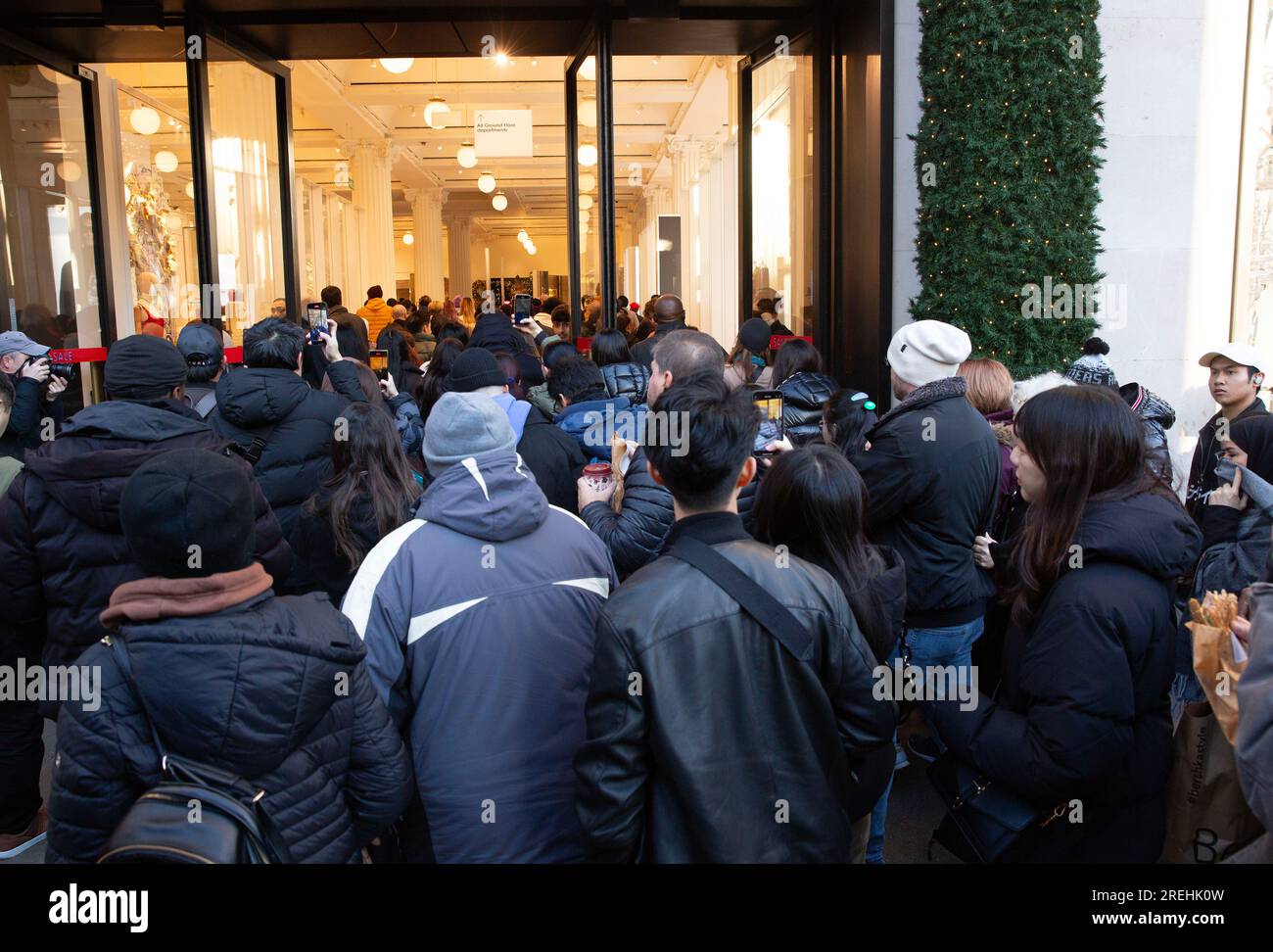 People enter Selfridges store on Oxford Street in London, at the ...