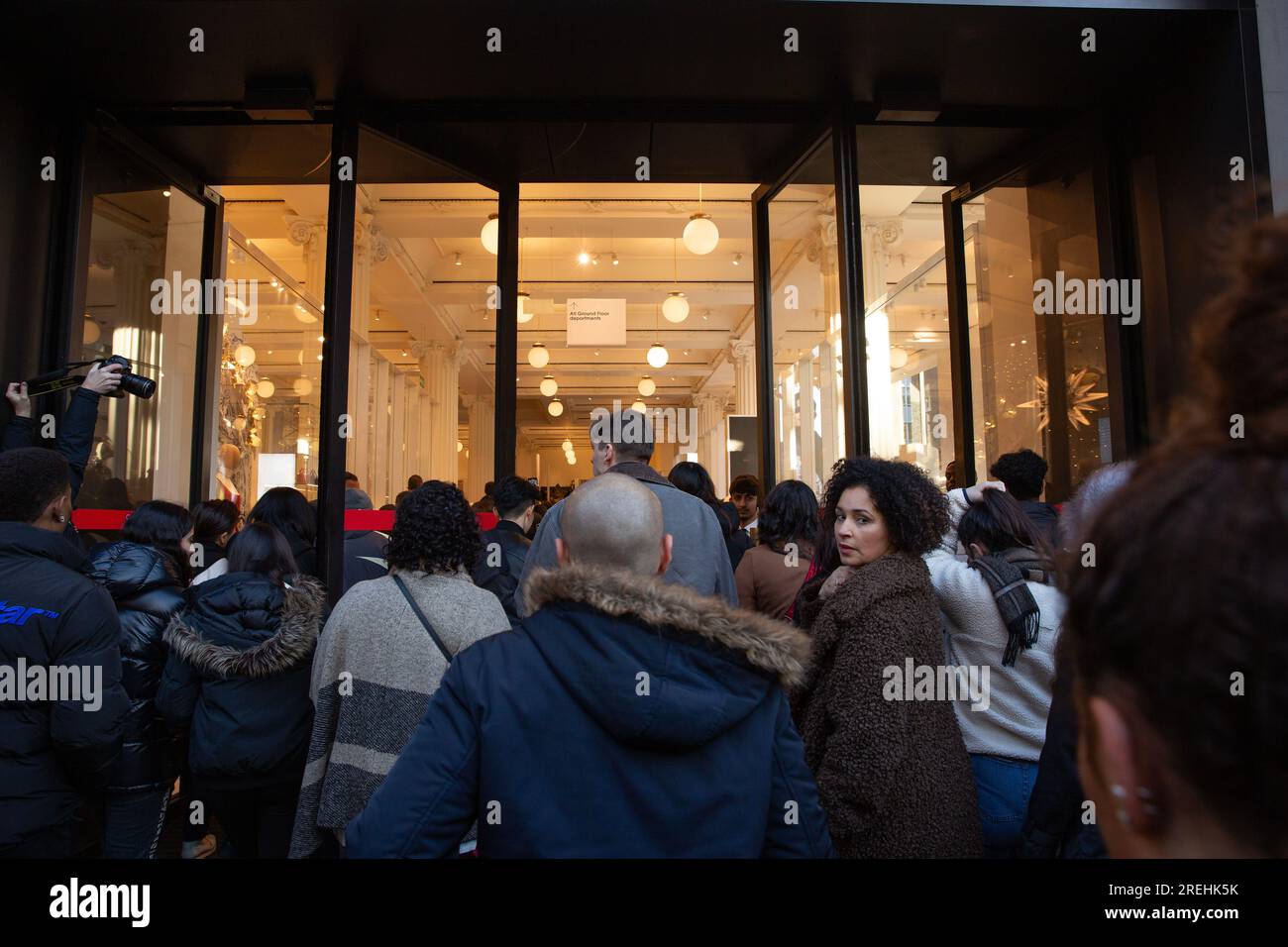People enter Selfridges store on Oxford Street in London, at the ...