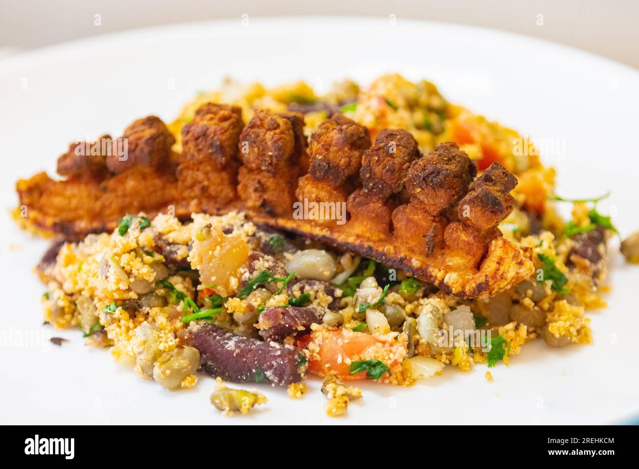 Traditional Brazilian dish known as "arrumadinho" made with green beans ...