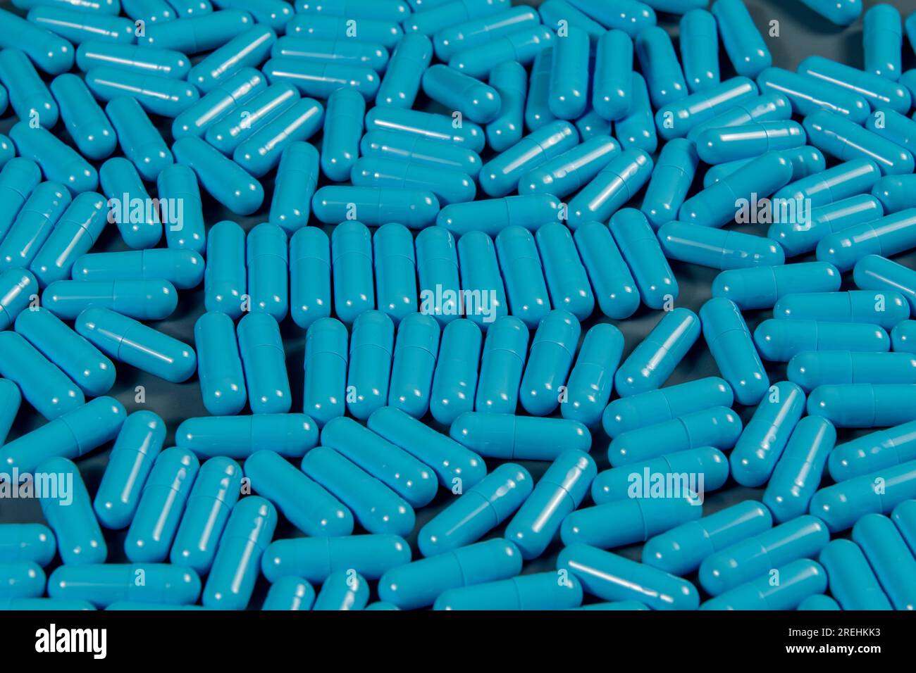 Blue antibiotic capsule pills texture. Pharmaceutical production ...