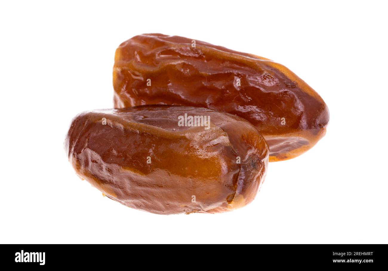 dates isolated on white background Stock Photo - Alamy