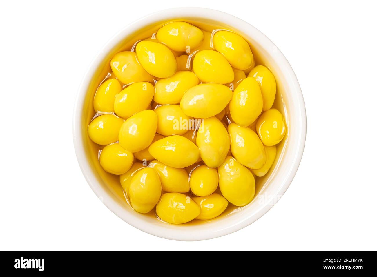 Top view of ginkgo seeds in syrup in white ceramic bowl isolated on ...