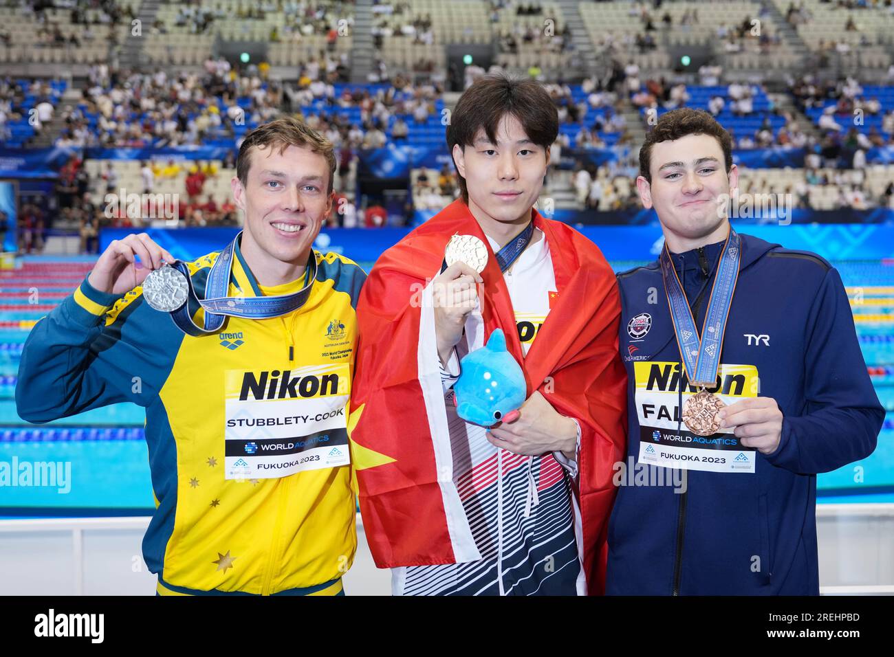 Fukuoka, Japan. 28th July, 2023. Gold medalist Qin Haiyang (C) of China ...