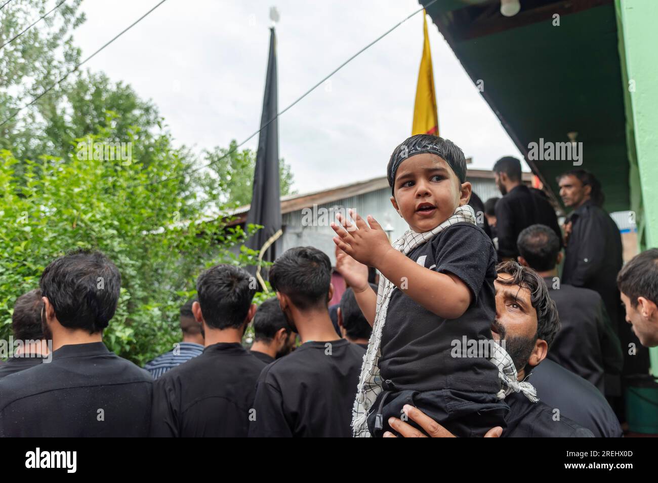 Srinagar, India. 28th July, 2023. A Shia Muslim kid beat his chest ...