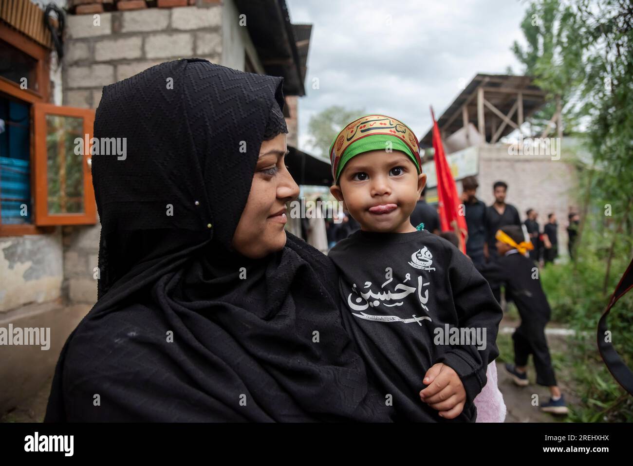 A Shia Muslim kid wearing religious headband during an Ashura ...