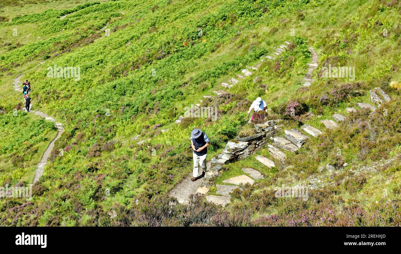 Knockan Crag West Highlands Geopark Scotland walkers on the stone steps ...