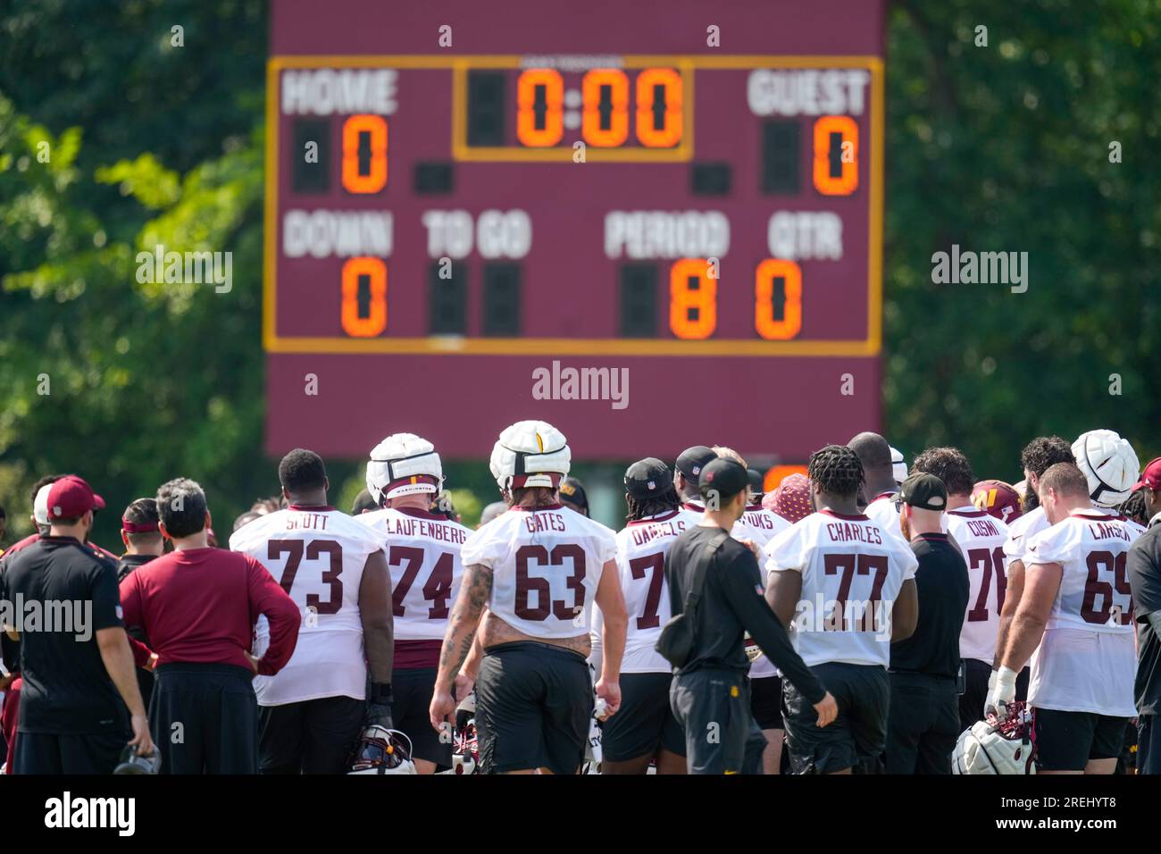 The Washington Commanders huddle up at the conclusion of a NFL football ...