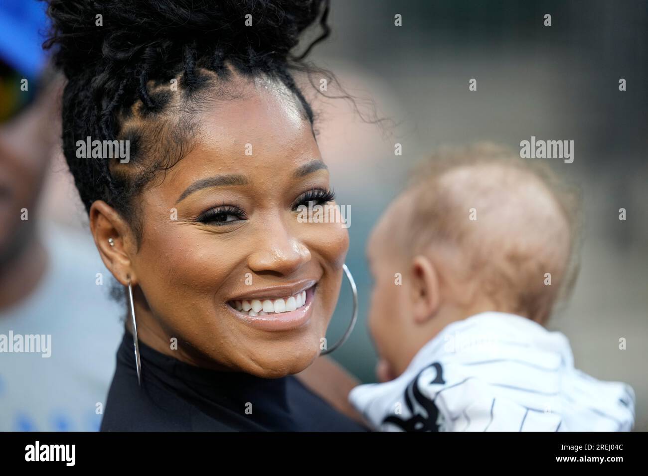 Actress Keke Palmer smiles as she holds her son, Leodis "Leo ...