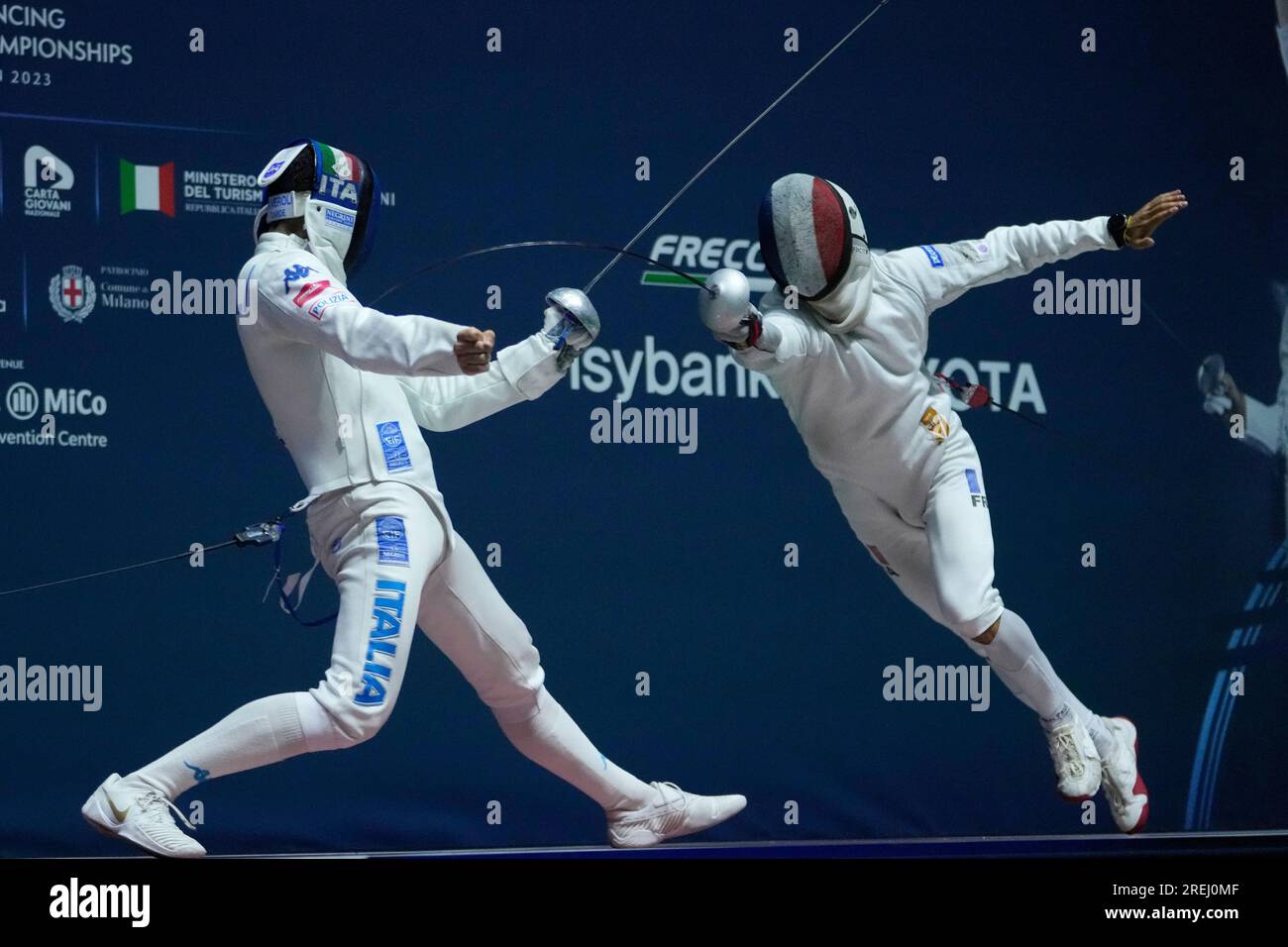 Italy's Davide Di Veroli, left, competes with France's Romain Cannone ...