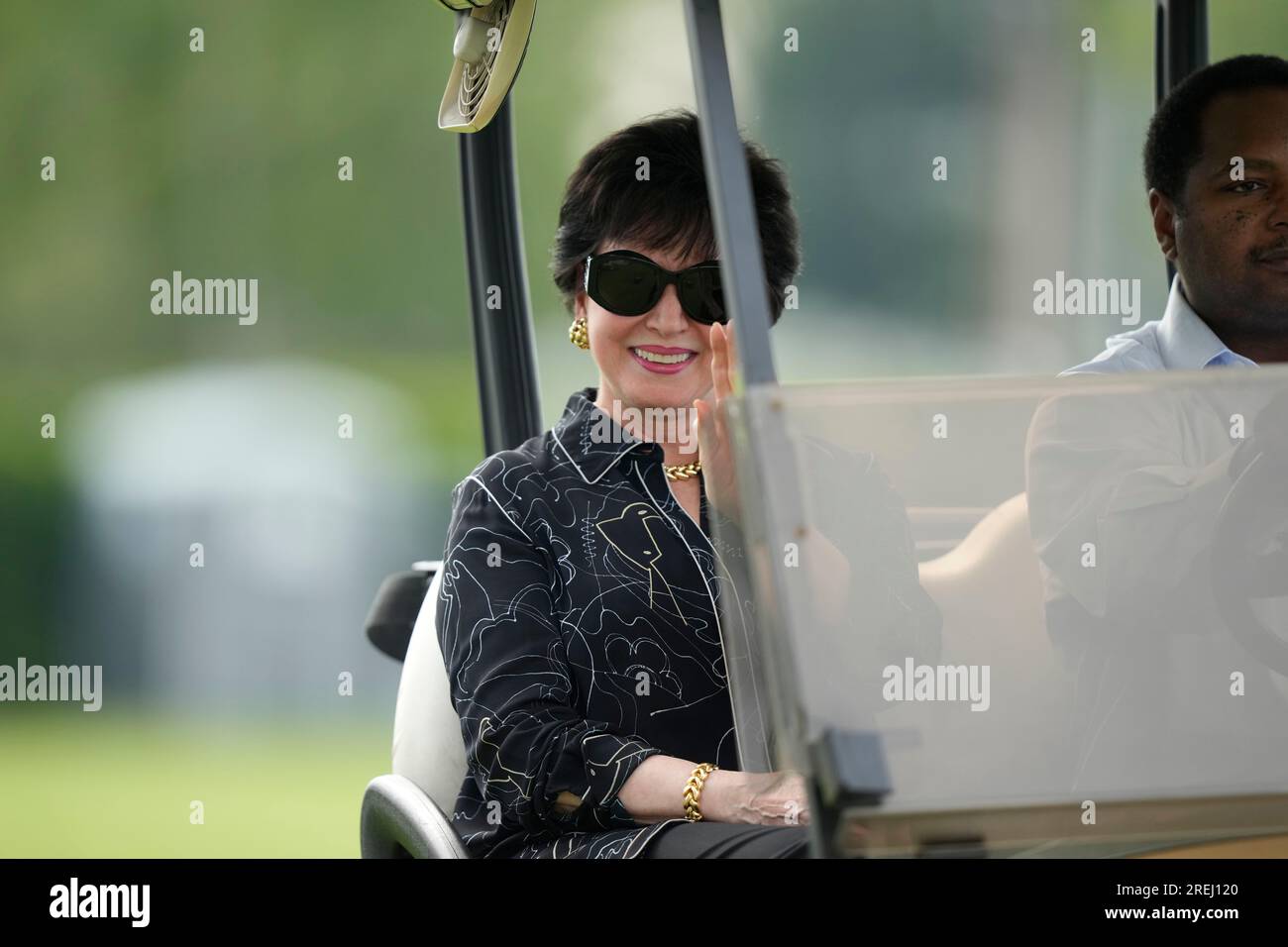 New Orleans Saints owner Gayle Benson smiles from a golf cart at the ...