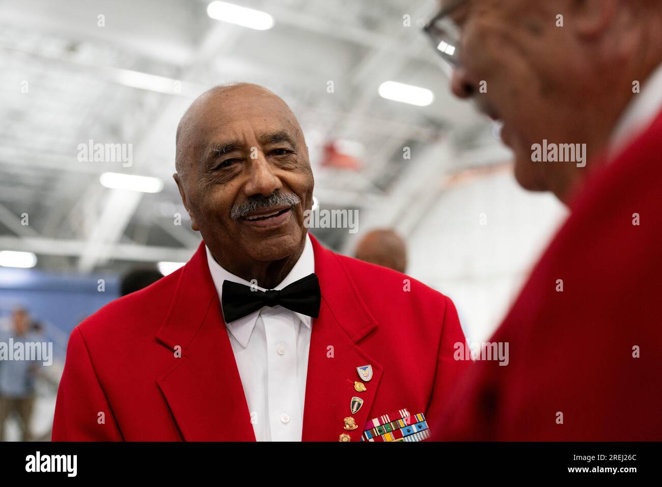 Retired Lt. Col. Shelton Ivan Ware speaks to guests during a PT-17 ...