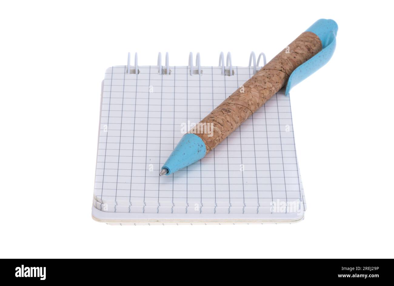 notepad with pen isolated on white background Stock Photo - Alamy