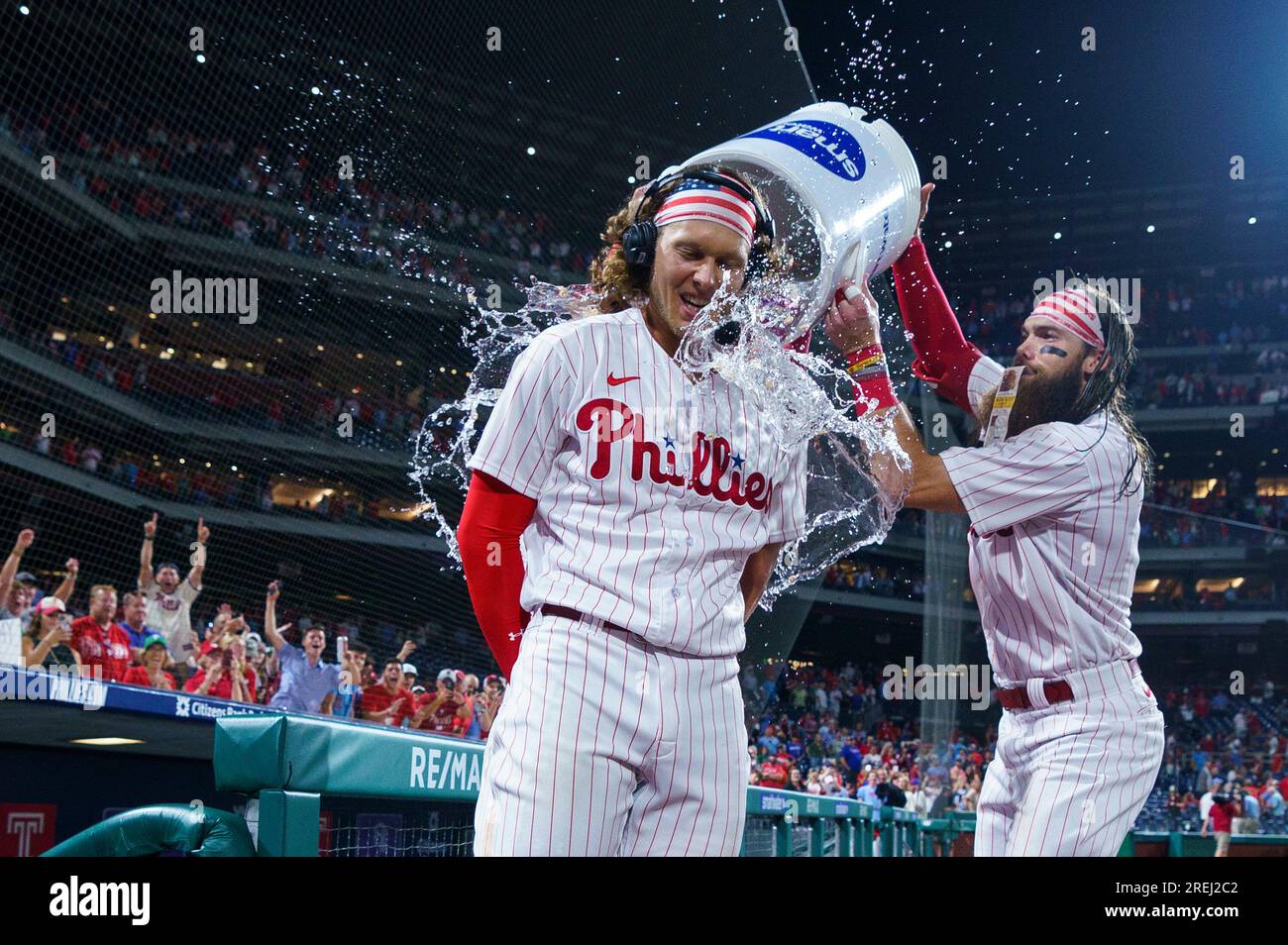 Philadelphia Phillies' Alec Bohm, left, gets doused by Bryson Stott ...