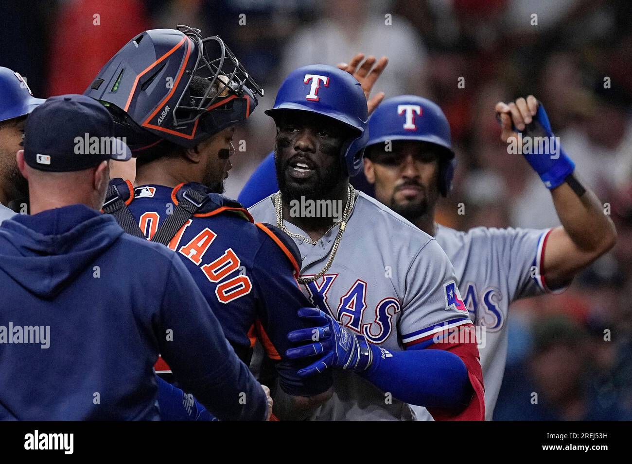 Houston Astros catcher Martin Maldonado and Texas Rangers' Adolis ...