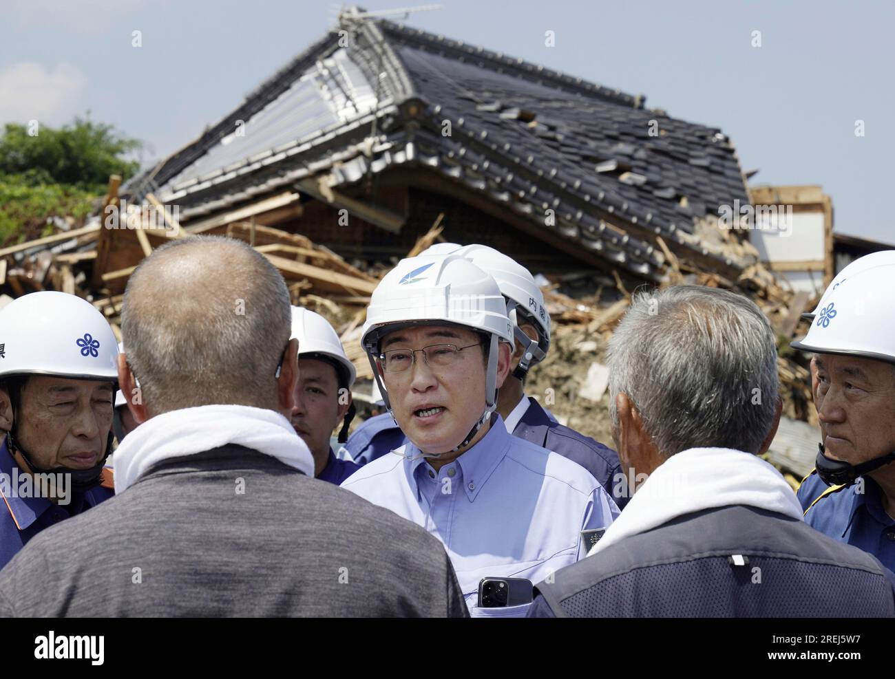 Japan's Prime Minister Fumio Kishida visit a debris flow site in Kurume ...