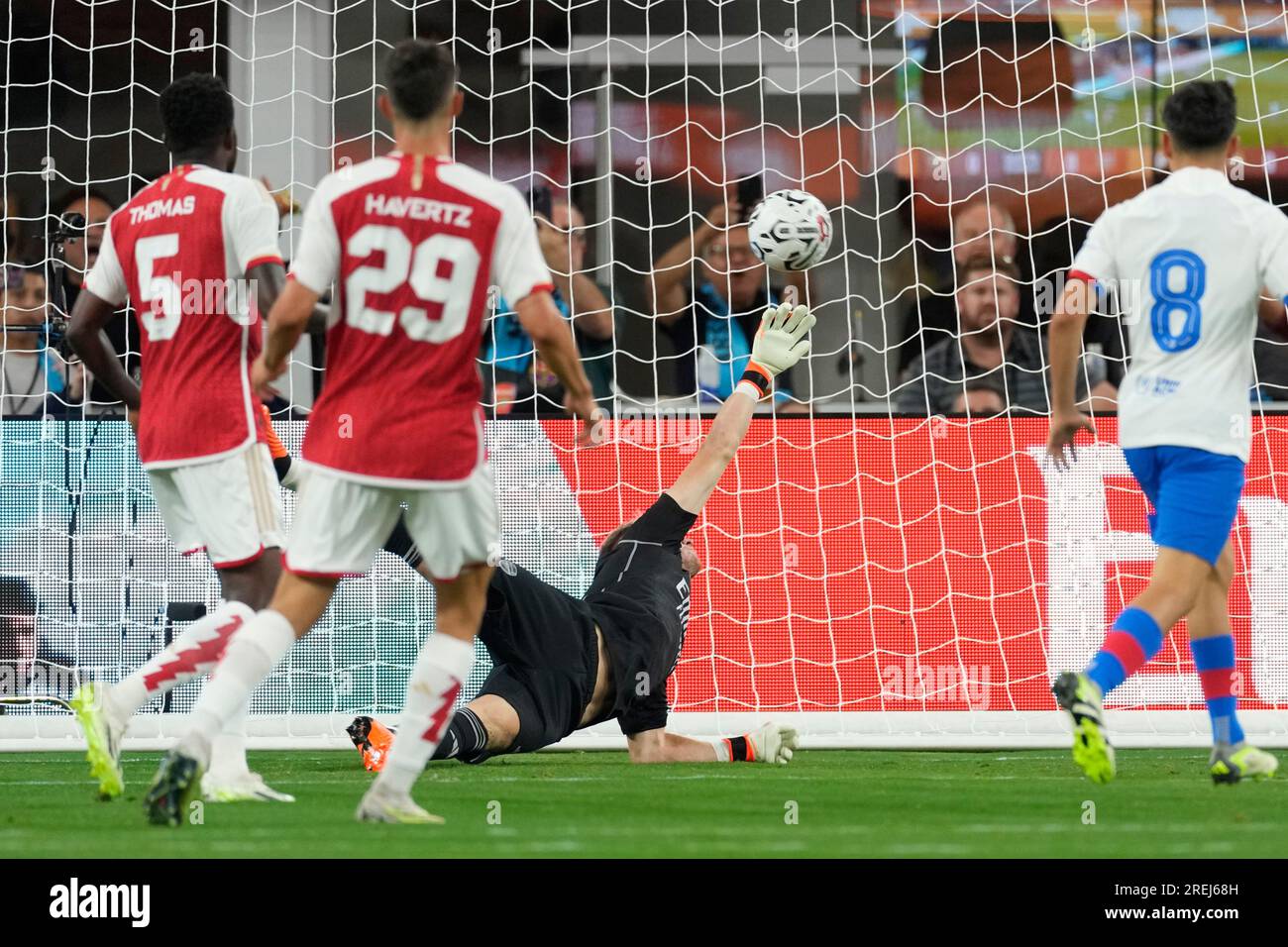 Arsenal FC goalkeeper Aaron Ramsdale (1) allows a goal by FC Barcelona ...