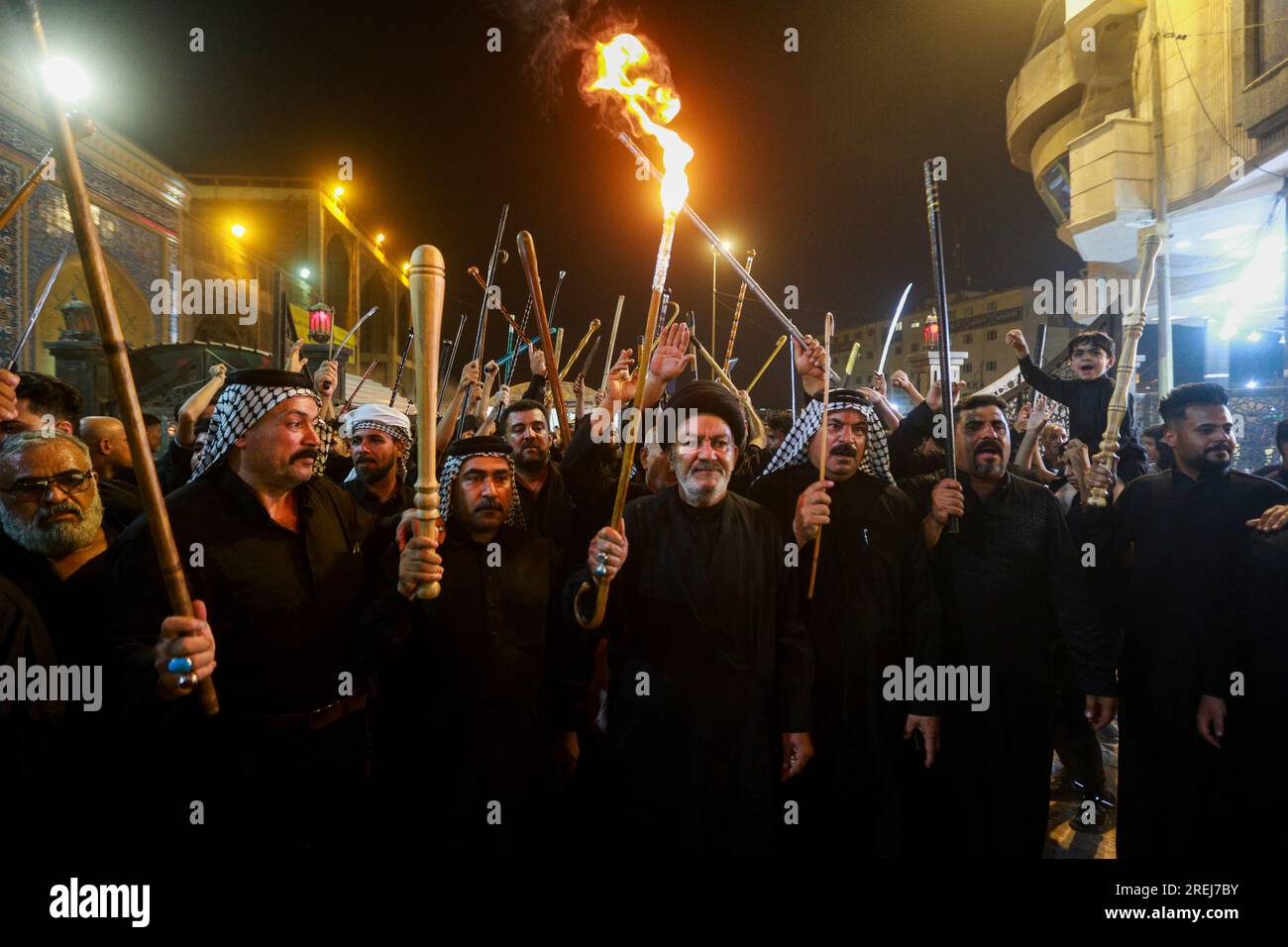 Shiites participate in Muharram processions in the Imam Ali shrine in ...