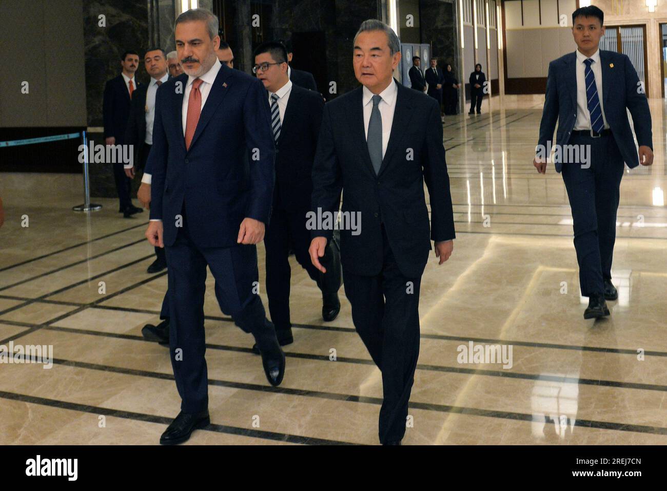 Turkish Foreign Minister Hakan Fidan, left, arrives with his Chinese ...