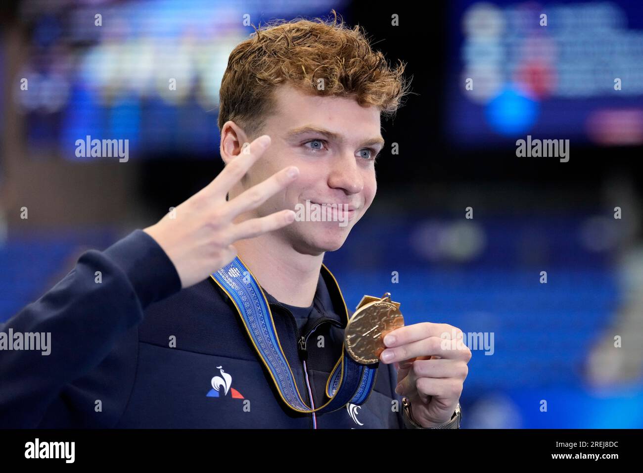 Gold medalist Leon Marchand of France celebrates during the medal ...