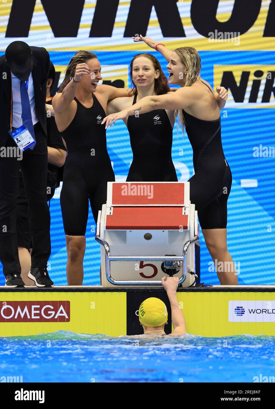 Members of Australia react during women's 4x200m freestyle relay final of World Aquatics ...