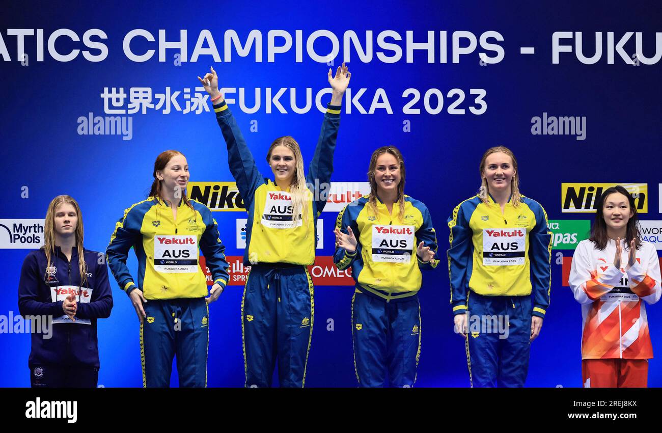 Members of Australia, winner, celebrate during an award ceremony of women's 4x200m freestyle ...