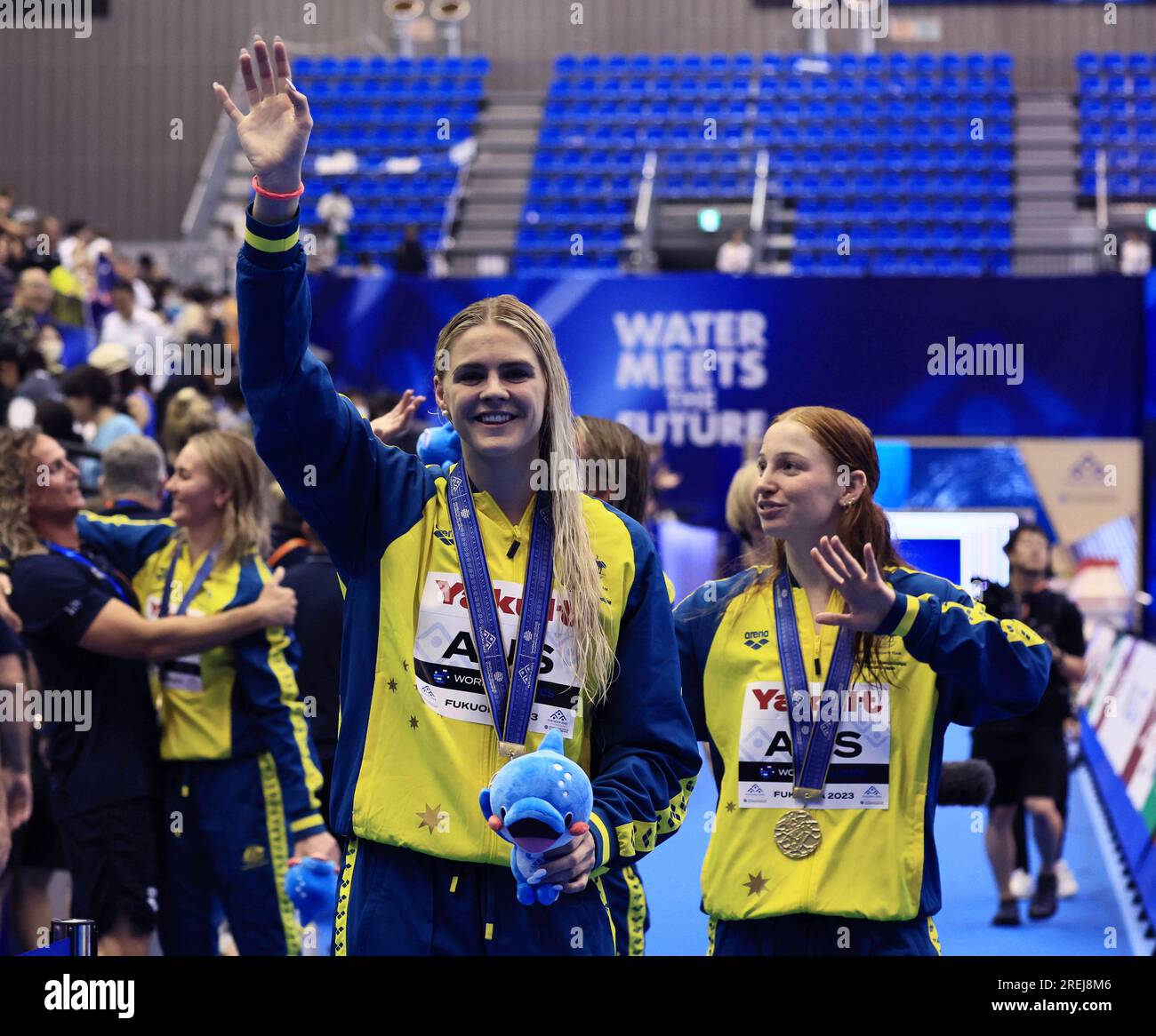 Members of Australia, winner, celebrate during an award ceremony of women's 4x200m freestyle ...
