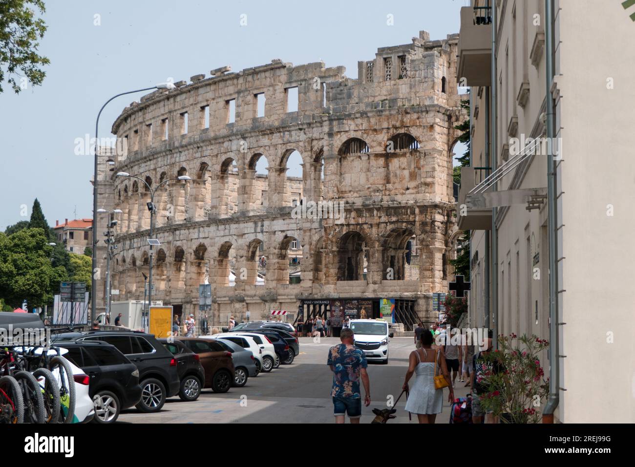 View of Pula (Pola) in Croatia with people and landmark: Pula Arena, a ...