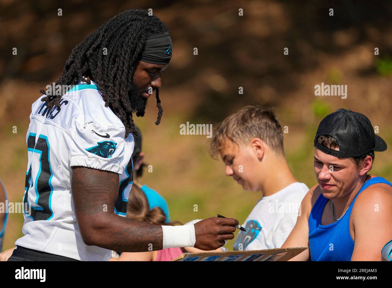 Carolina Panthers tight end Ian Thomas signs autographs at the NFL ...