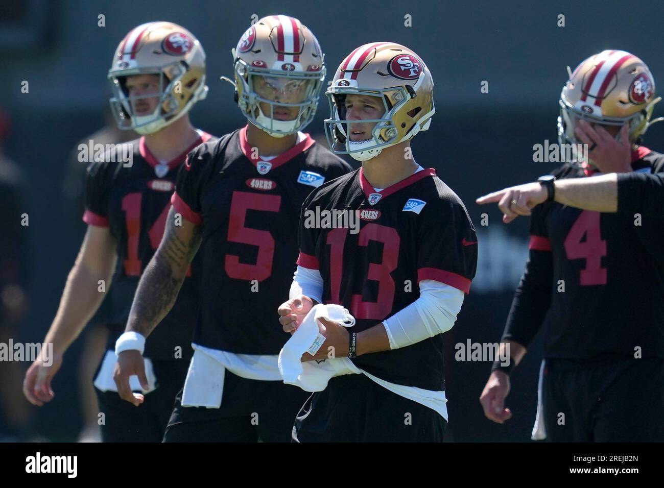 San Francisco 49ers quarterback Brock Purdy (13) stands in front of Sam ...