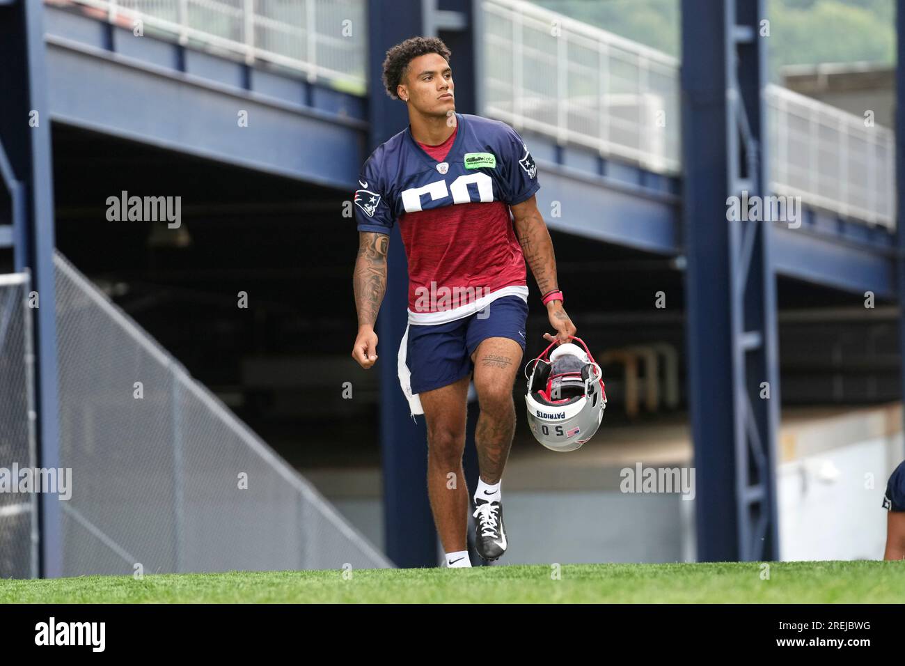 New England Patriots cornerback Christian Gonzalez steps on the field ...