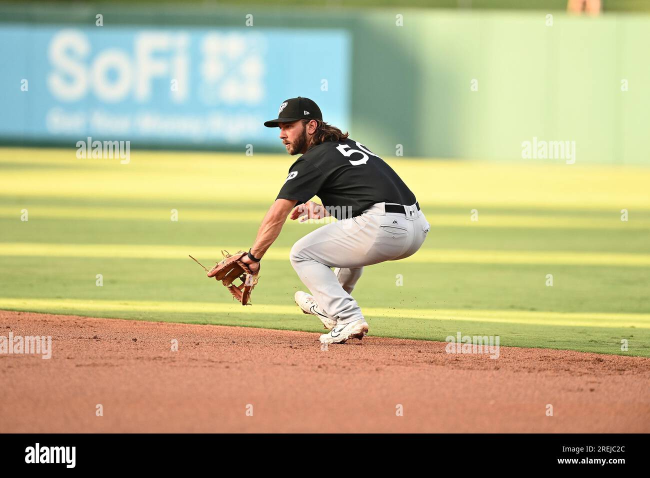 Second baseman Max Schrock (50) of the El Paso Chihuahuas fields a ...