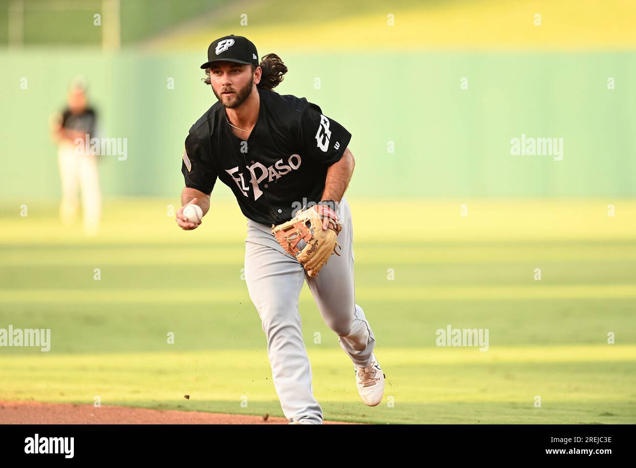 Second baseman Max Schrock (50) of the El Paso Chihuahuas throws to ...