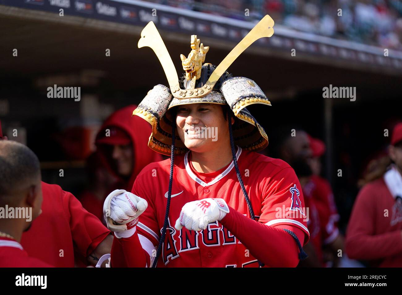 Los Angeles Angels' Shohei Ohtani celebrates wearing a Kabuto samurai ...