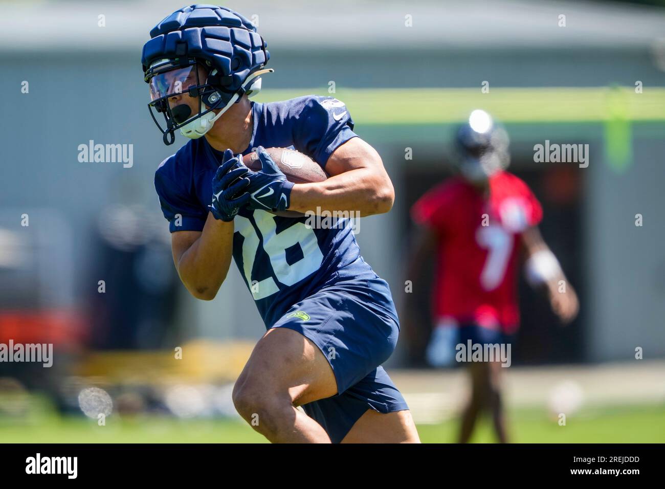Seattle Seahawks running back Zach Charbonnet carries the ball during ...
