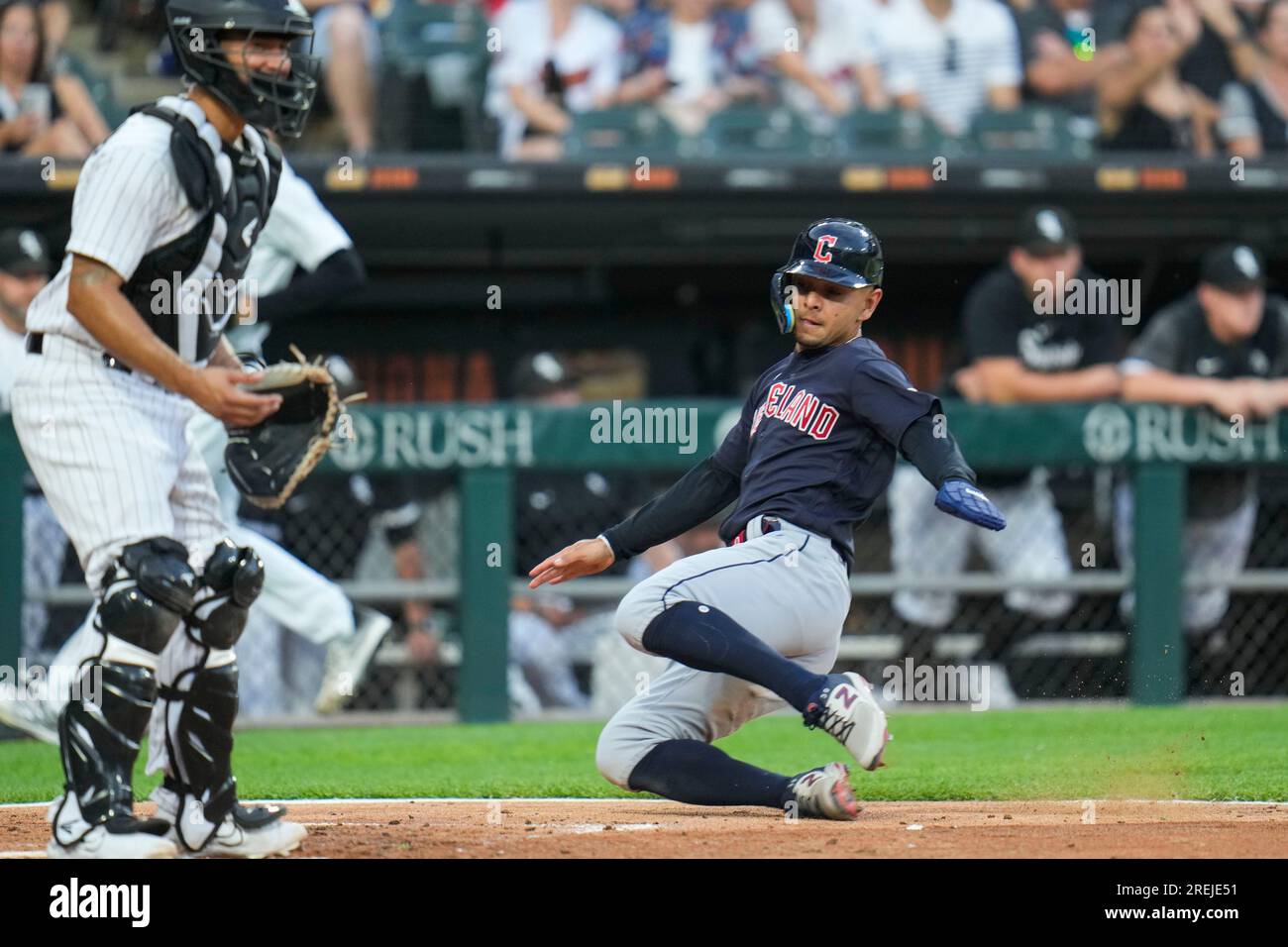 Cleveland Guardians' Andres Gimenez slides past Chicago White Sox ...