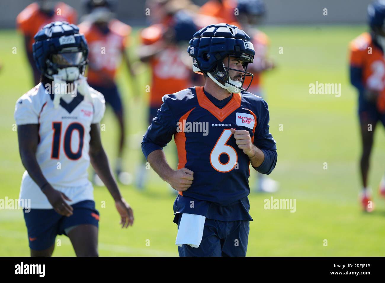 Denver Broncos quarterback Ben DiNucci (6) takes part in drills during ...