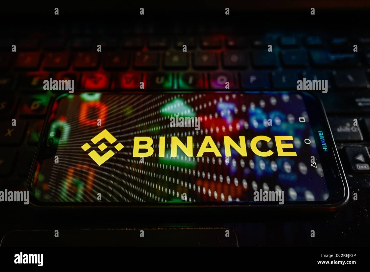 In this photo illustration a Binance logo is displayed on a smartphone ...