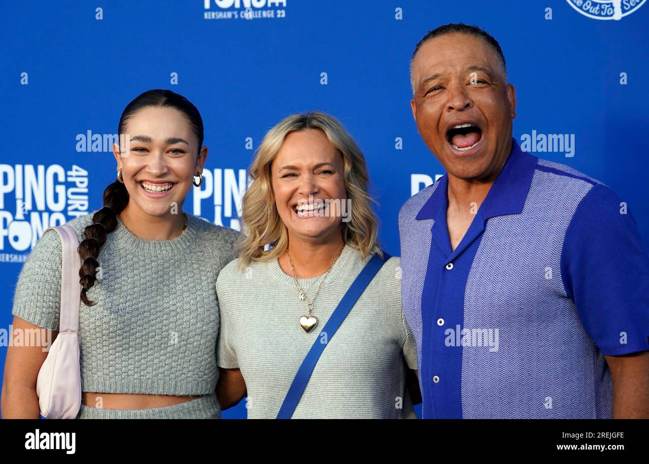 Los Angeles Dodgers manager Dave Roberts poses with his wife Tricia ...