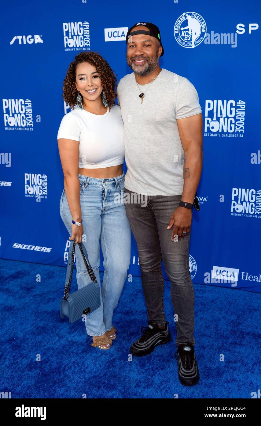 Derek Fisher and Gloria Govan pose together at the 10th Annual ...
