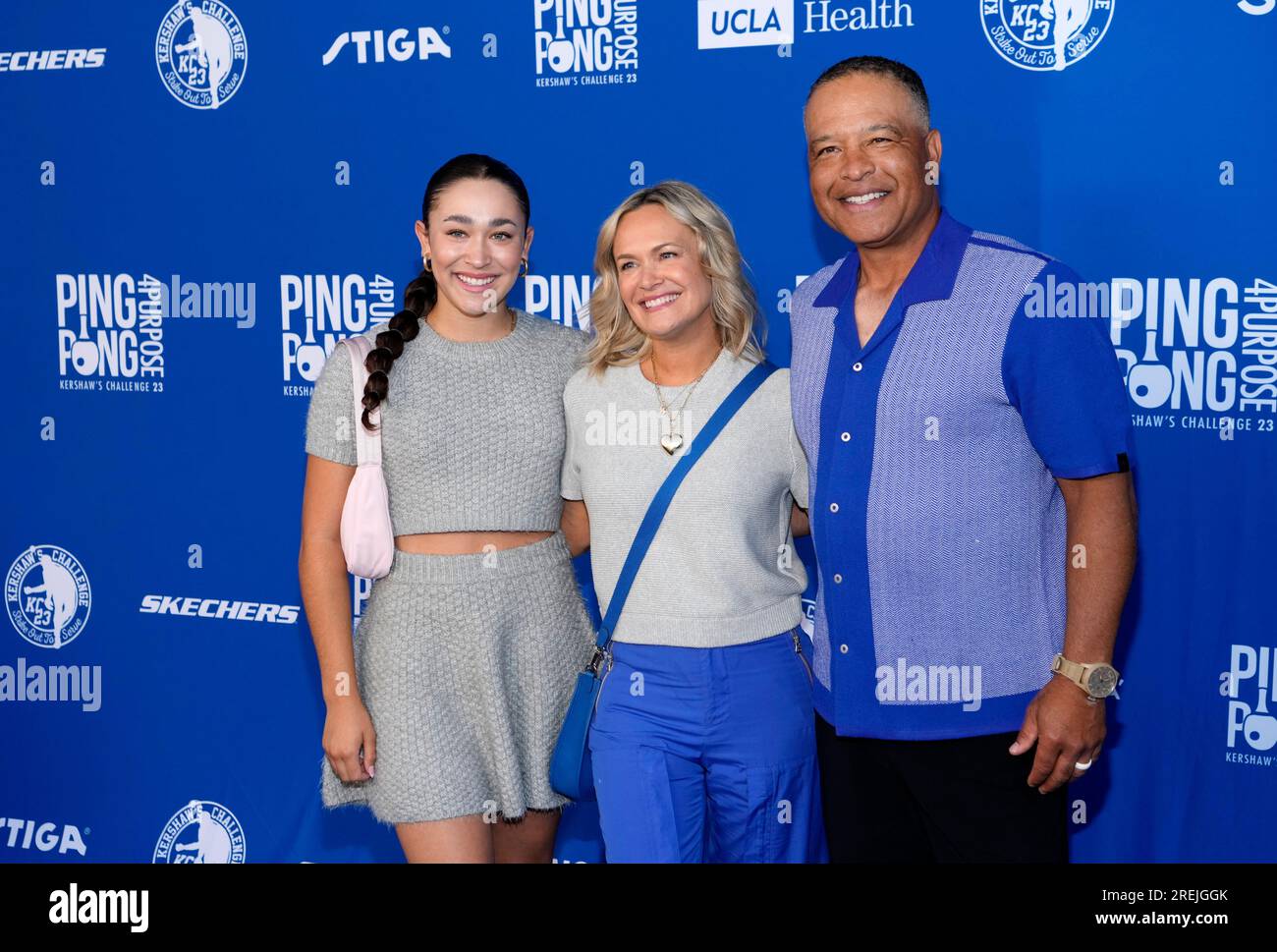 Los Angeles Dodgers manager Dave Roberts poses with his wife Tricia ...