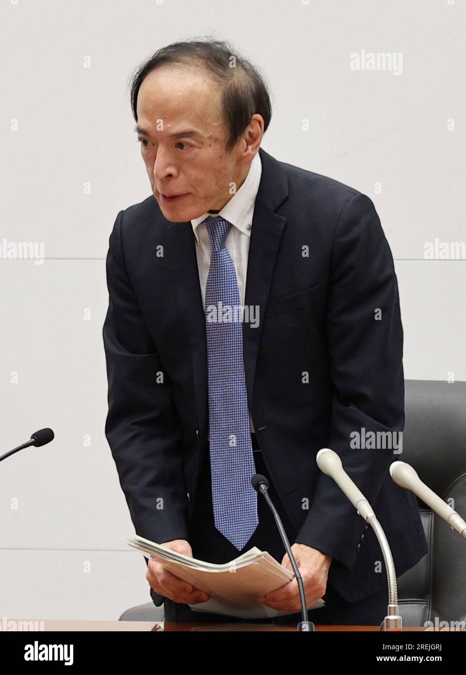 Kazuo Ueda, Governor of Bank of Japan (BOJ) attends a press conference ...