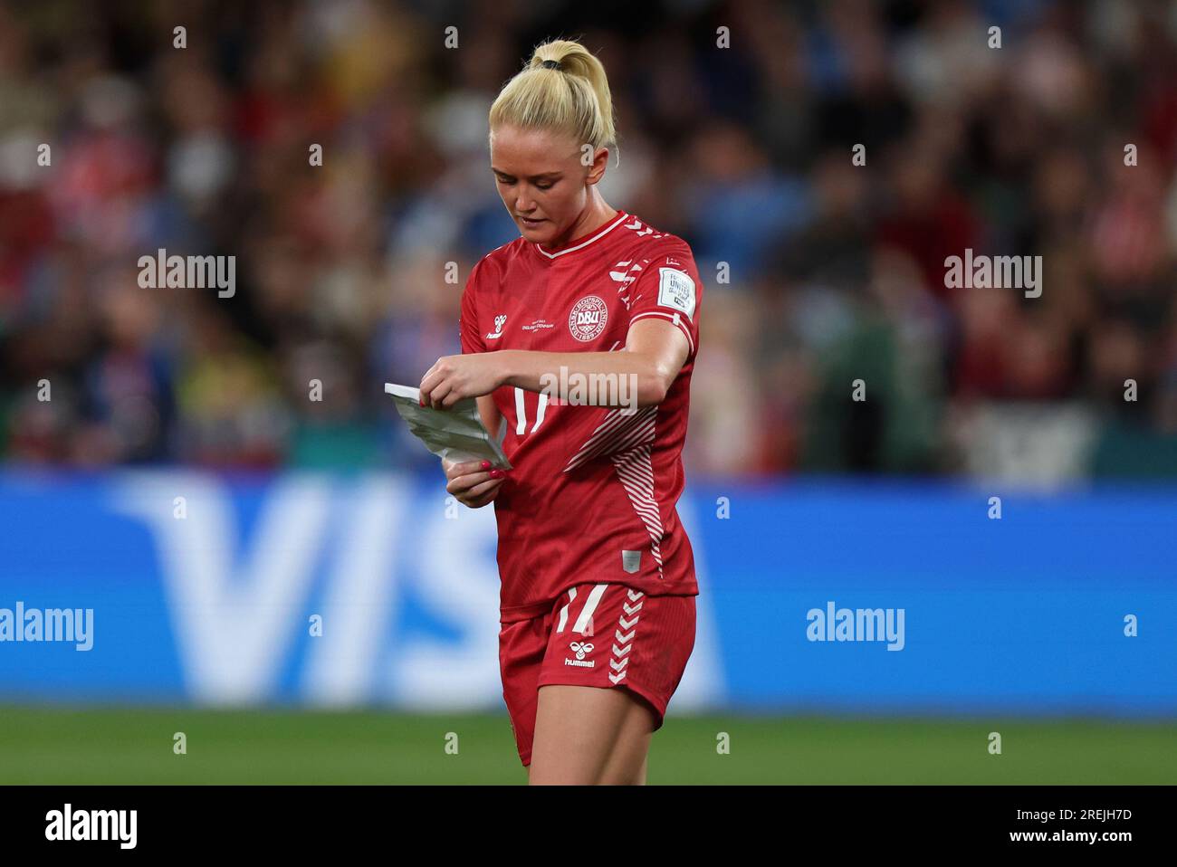 Denmark's Rikke Marie Madsen checks a sheet of paper during the Women's ...