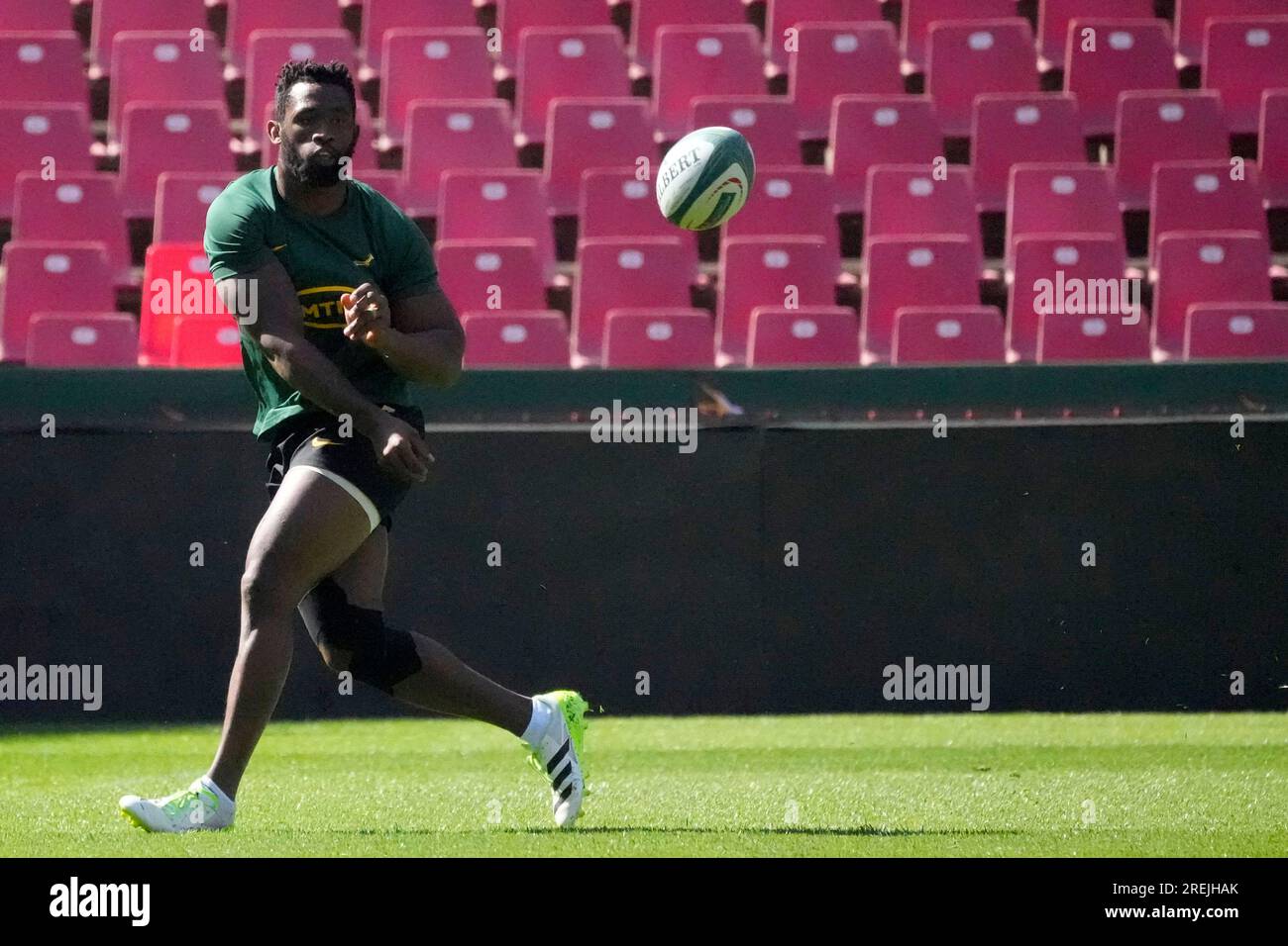 South Africa's Siya Kolisi passes the ball during their practise at ...