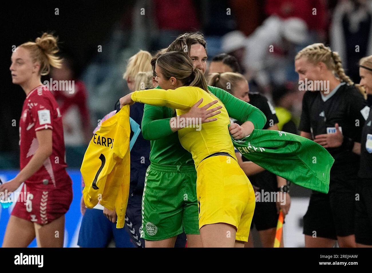 England's goalkeeper Mary Earps, right, hugs Denmark's goalkeeper Lene ...
